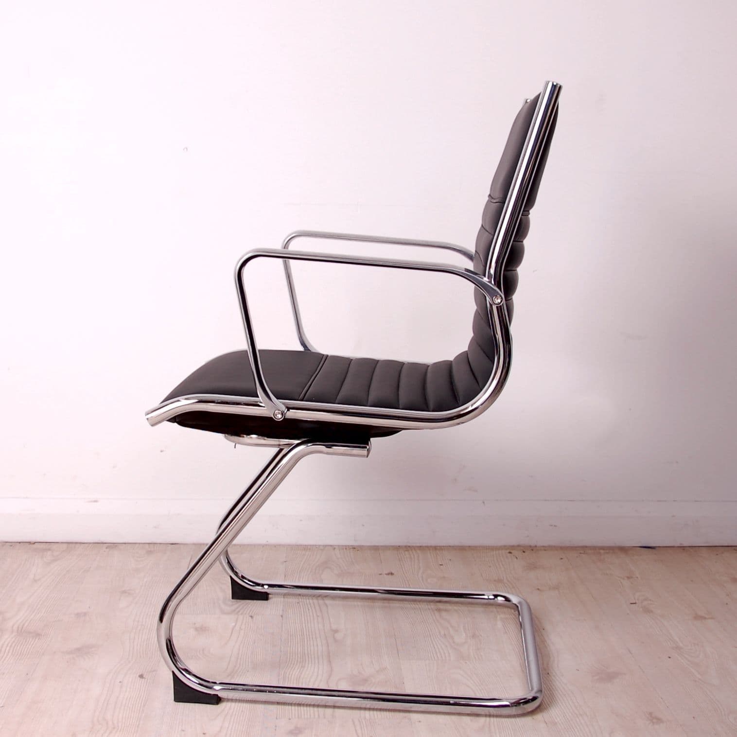 Black Eames Style Meeting Chair | cantilever chair | black leather chair