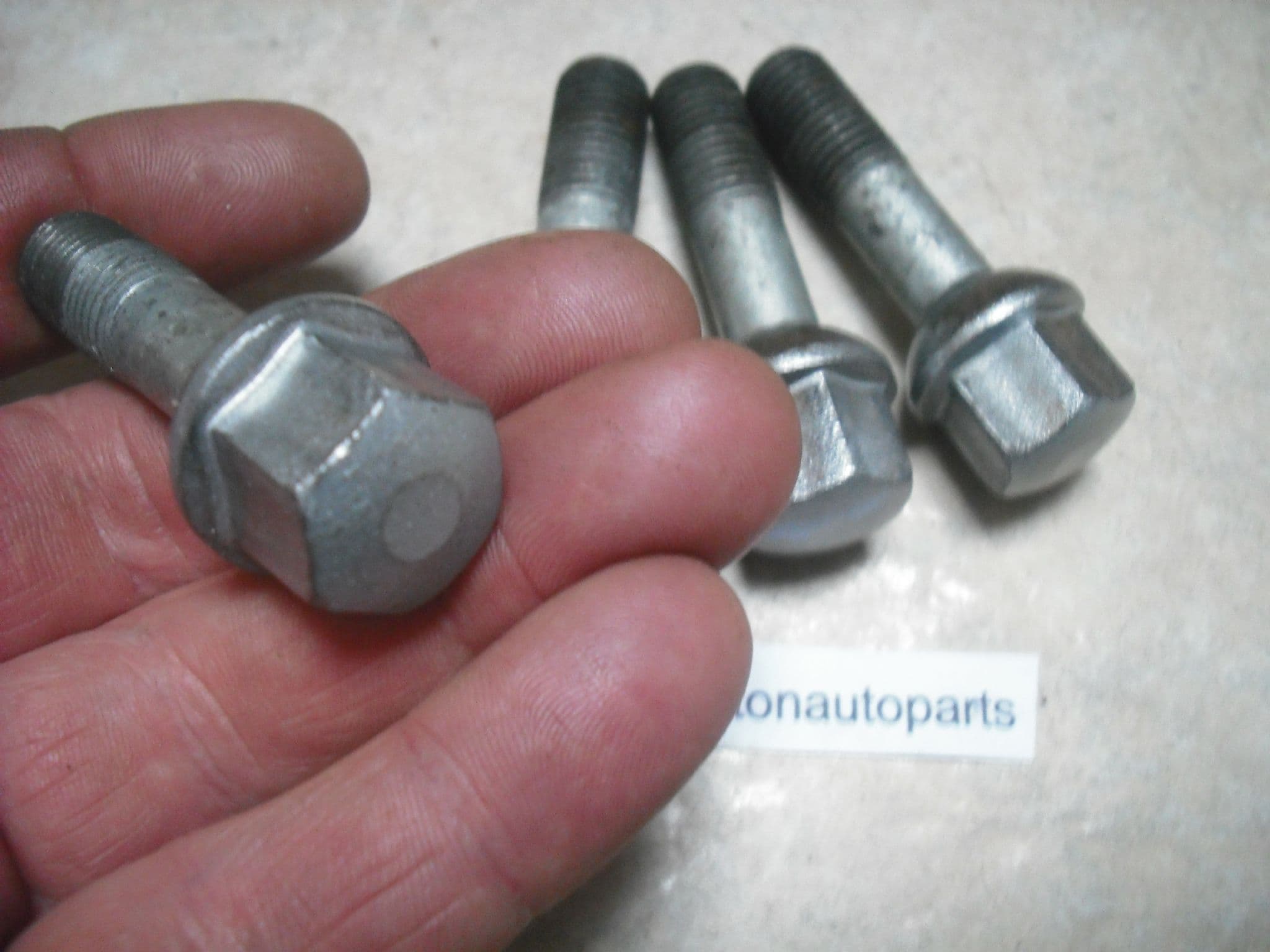 4 LONG GENUINE MERCEDES BENZ W208 CLK W203 C CLASS AND R170 SLK WHEEL BOLTS