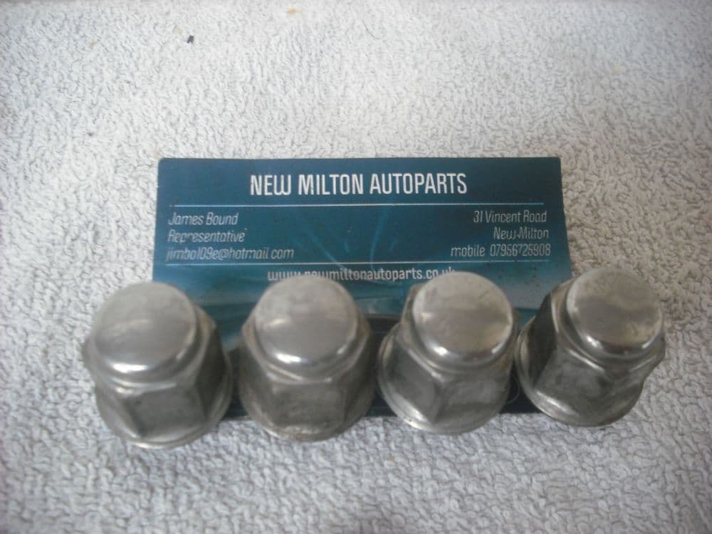 4 X GENUINE CHRYSLER PT CRUISER CHROME WHEEL NUTS