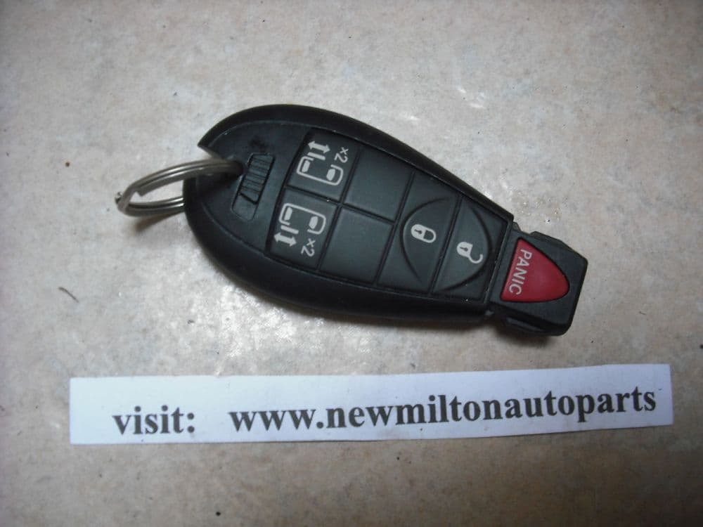 A GENUINE DODGE CARAVAN TOWN AND COUNTRY REMOTE CENTRAL LOCKING KEY FOB