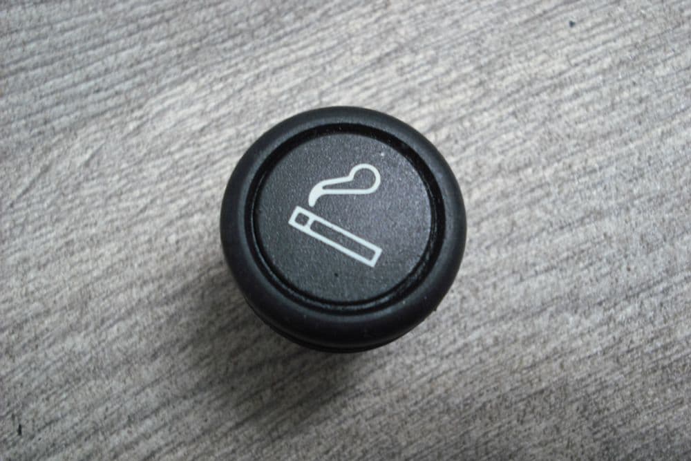 A GENUINE FIAT PANDA CIGARETTE LIGHTER INSERT
