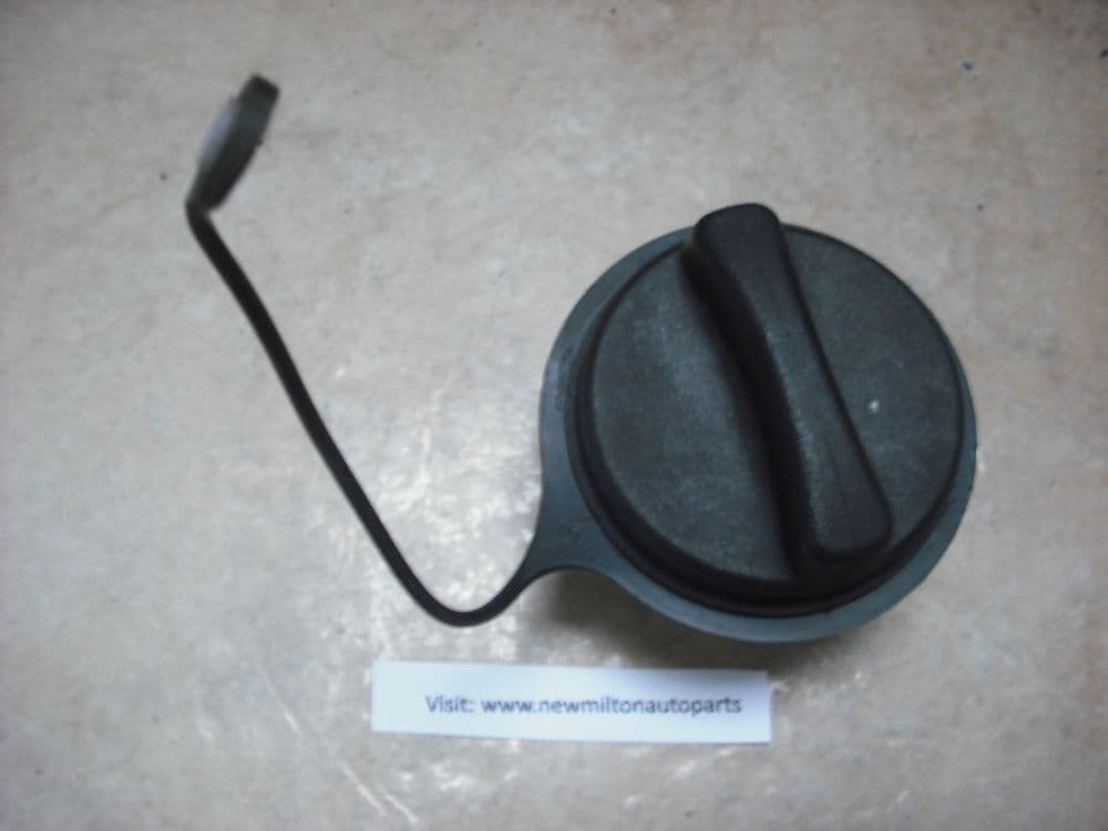 A GENUINE JAGUAR S TYPE FUEL PETROL OR DIESEL CAP WITH TIE