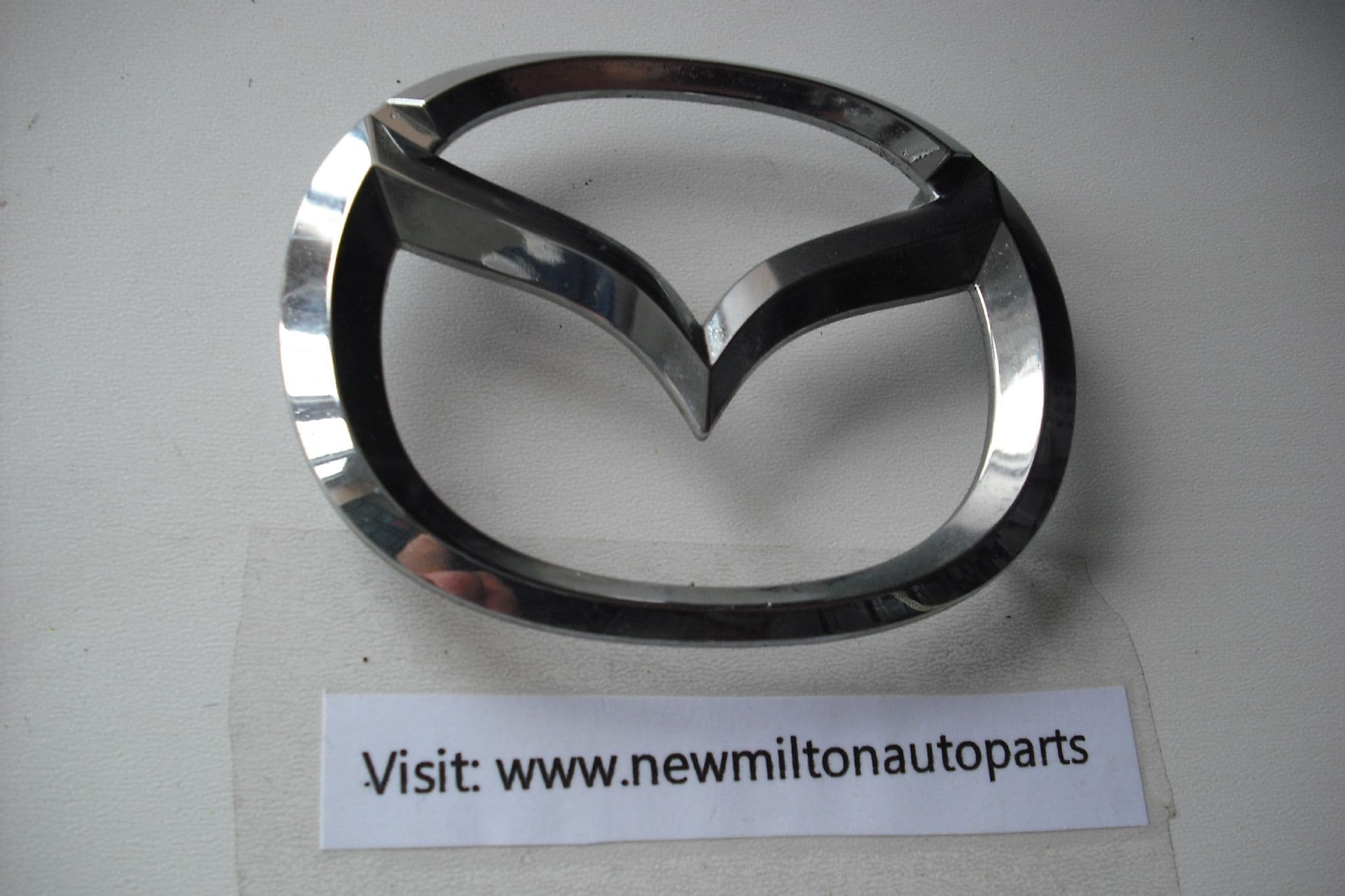 A GENUINE MAZDA MK5 MK2 FRONT MAZDA BADGE