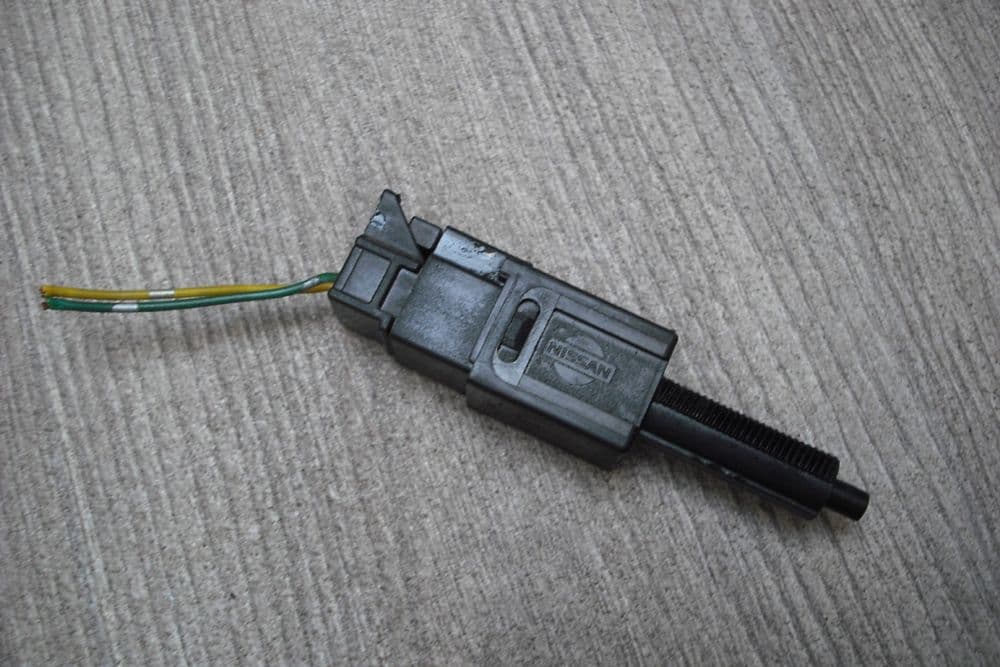 A GENUINE NISSAN MICRA REAR BRAKE LIGHT PEDAL SWITCH SENSOR