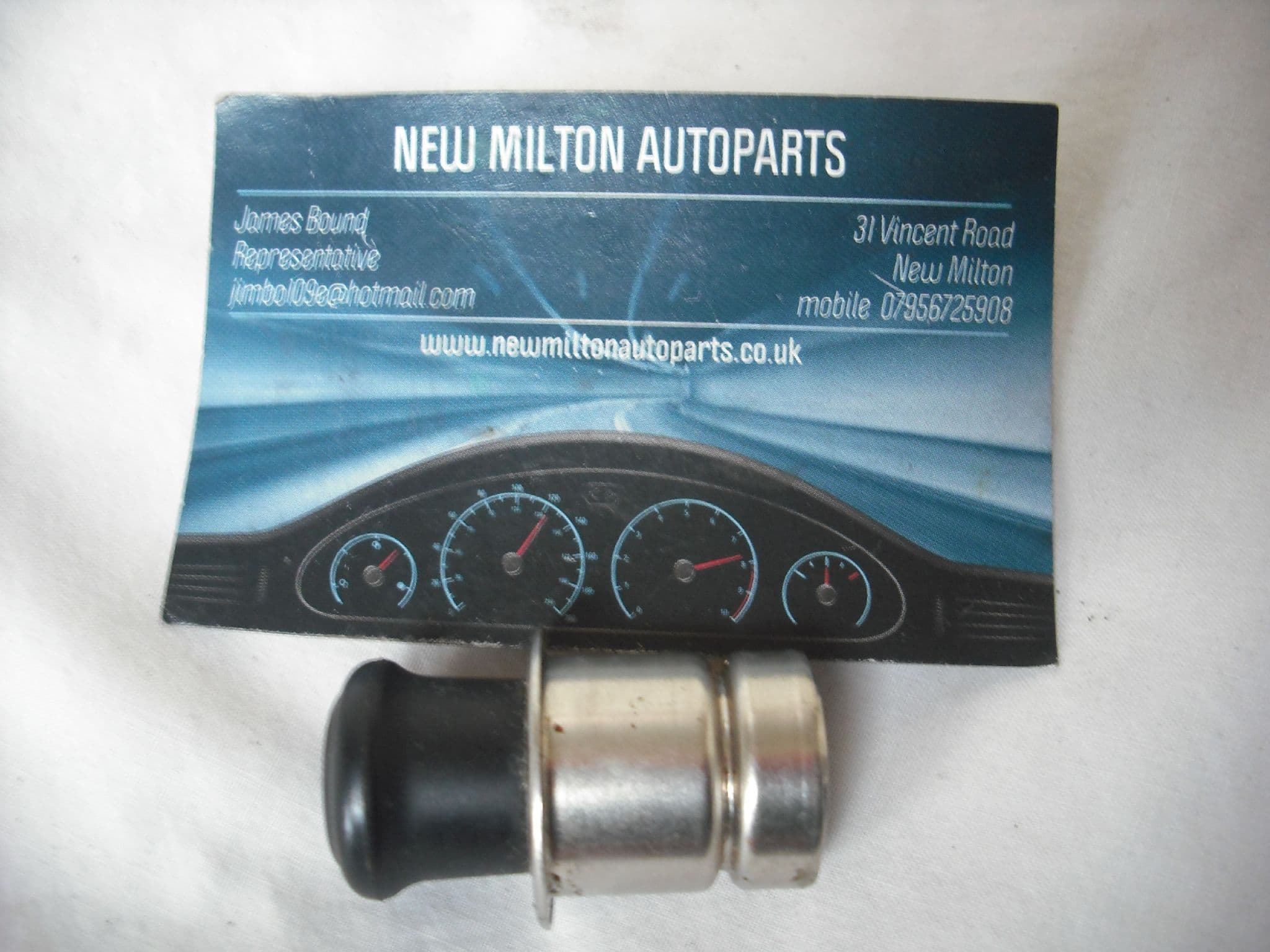 A GENUINE SUBARU LEGACY OUTBACK CIGARETTE LIGHTER INSERT