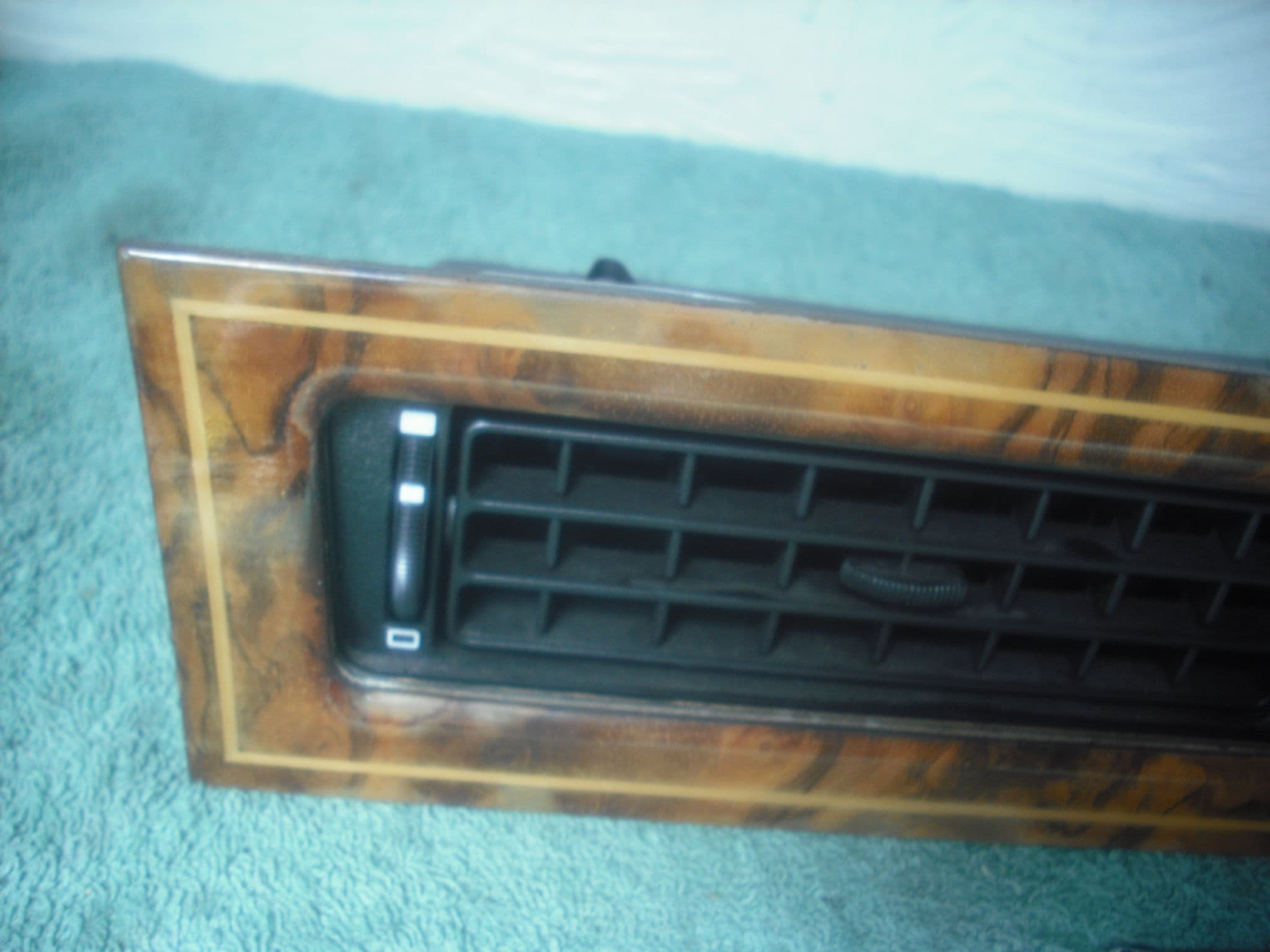 sold A JAGUAR XJ6 XJ40 DASH AIR VENTS AND CENTRAL WOOD TRIM PANEL