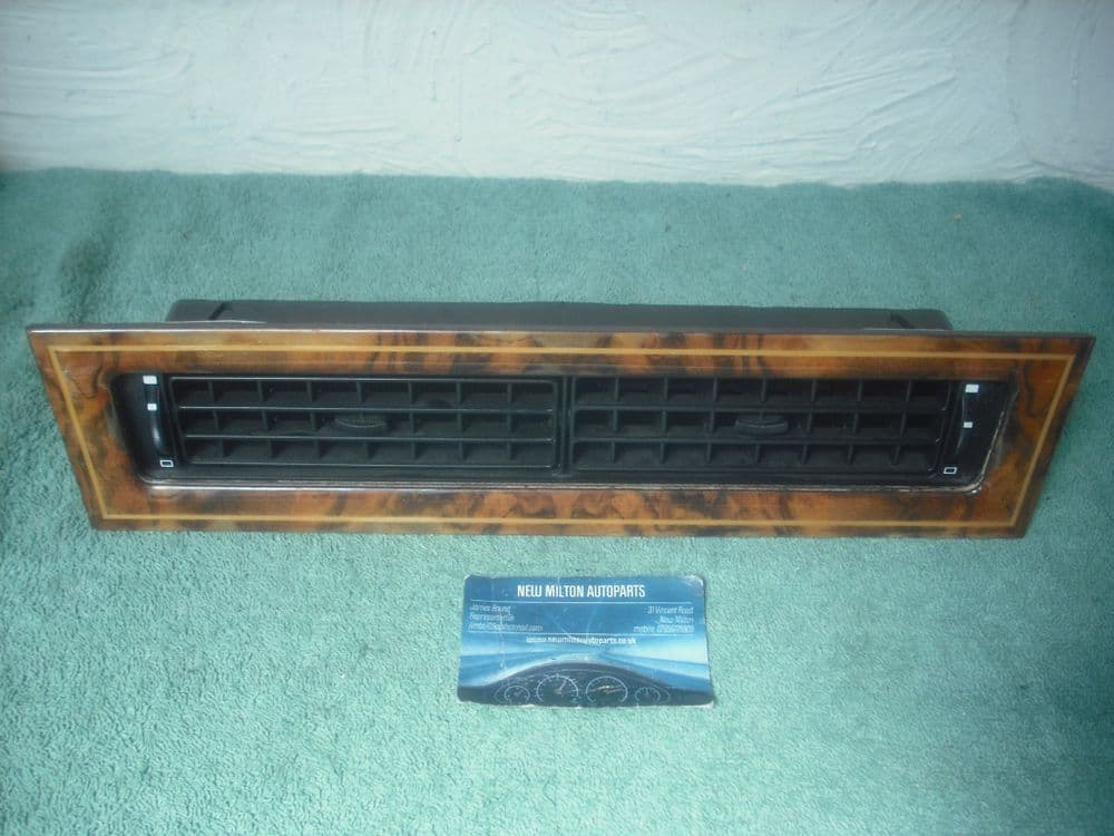 sold A JAGUAR XJ6 XJ40 DASH AIR VENTS AND CENTRAL WOOD TRIM PANEL