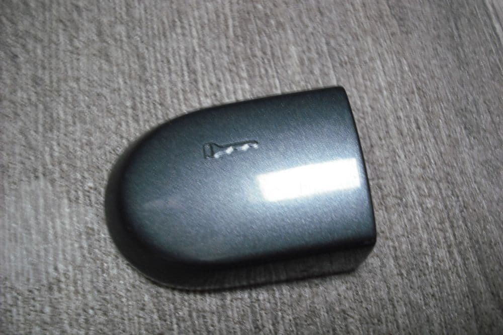 SOLD NISSAN NOTE FRONT DOOR HANDLE LOCK BARREL COVER CAP