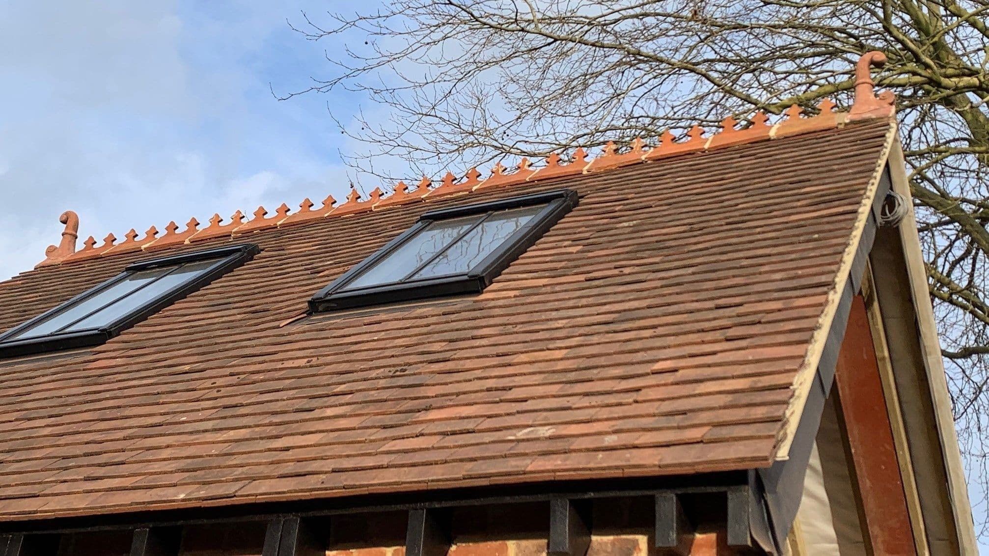 Scroll Victorian style roof finial angled ridge