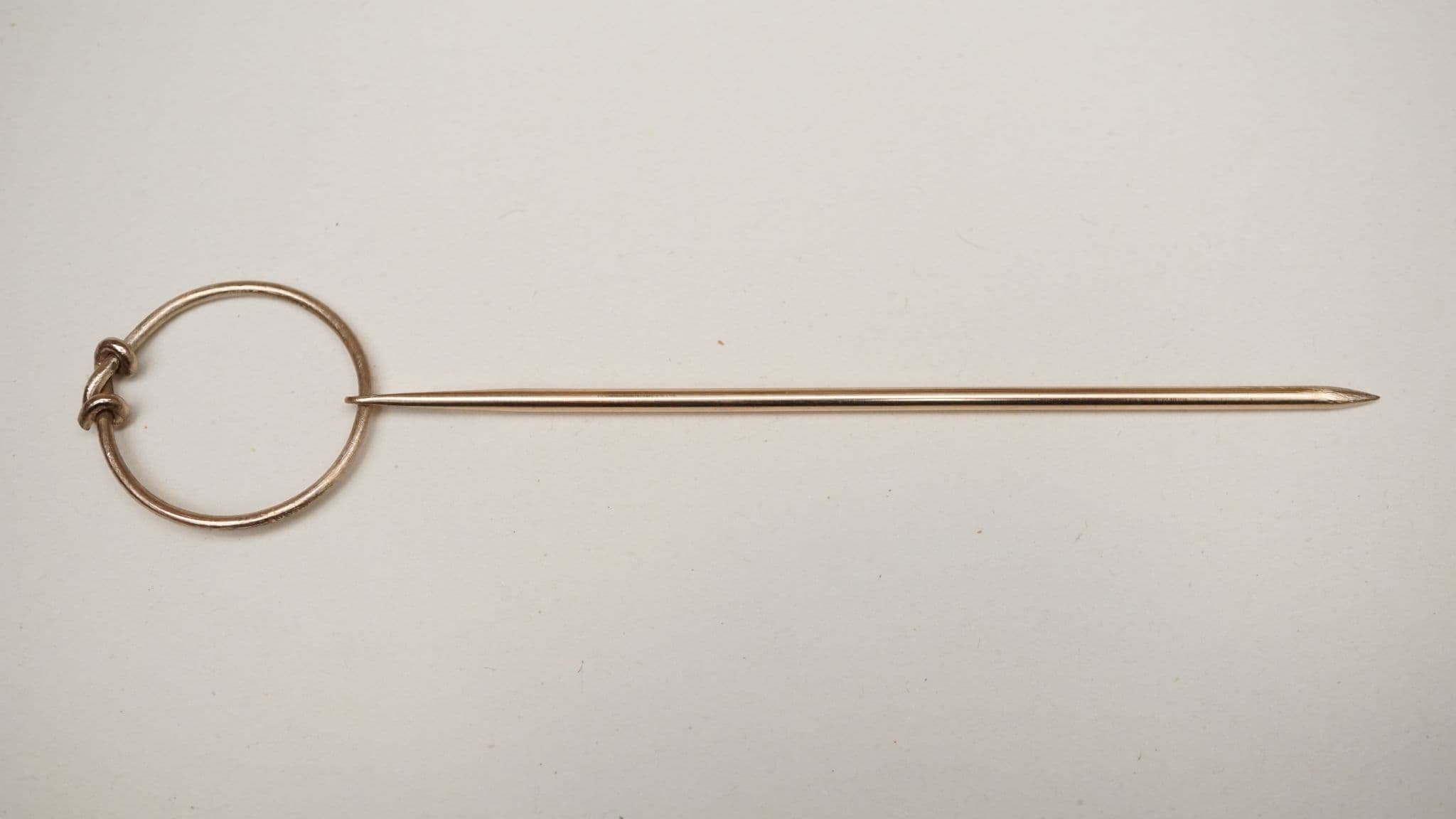 Anglo-saxon bronze toilet pin on a slipknot ring Abingdon Find