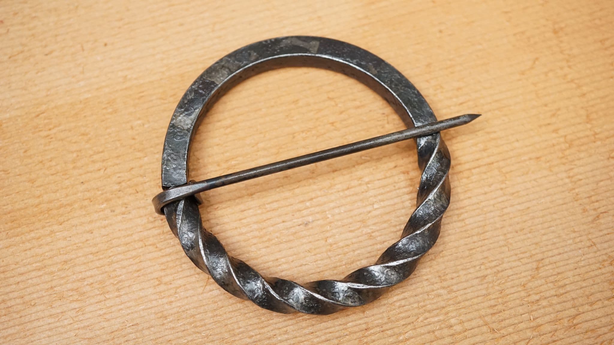 medieval forged steel annular brooch half twist London find