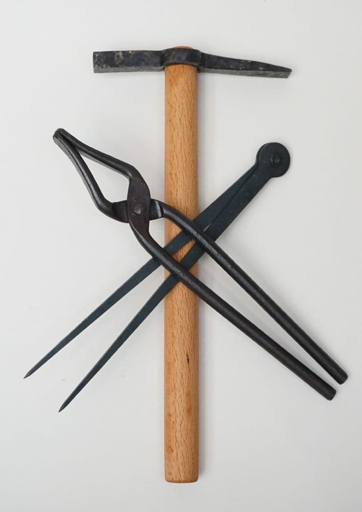 Multi period tool set roman to medieval hammer pliers and dividers