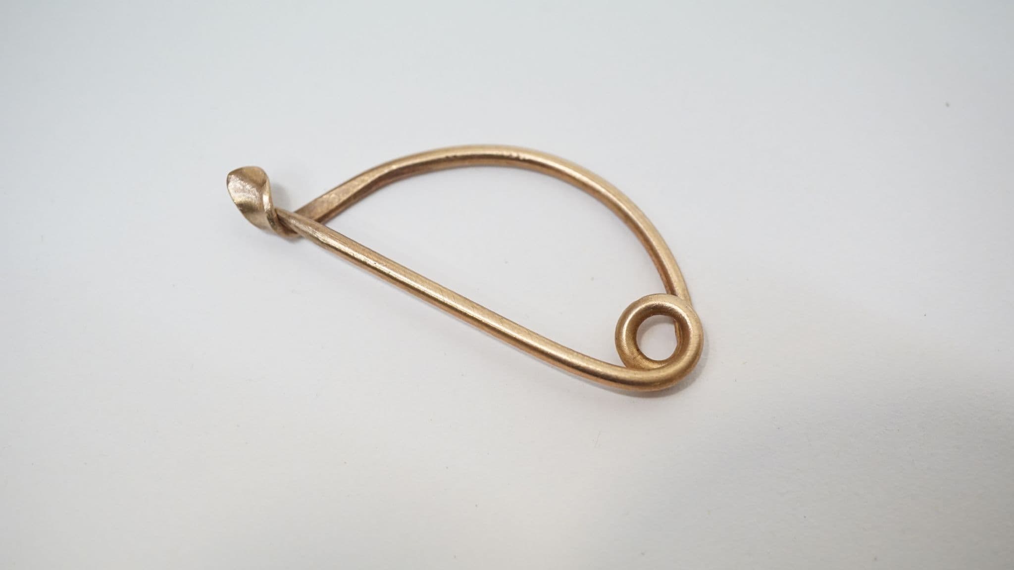 roman forged bronze fibula 2 4mm diameter