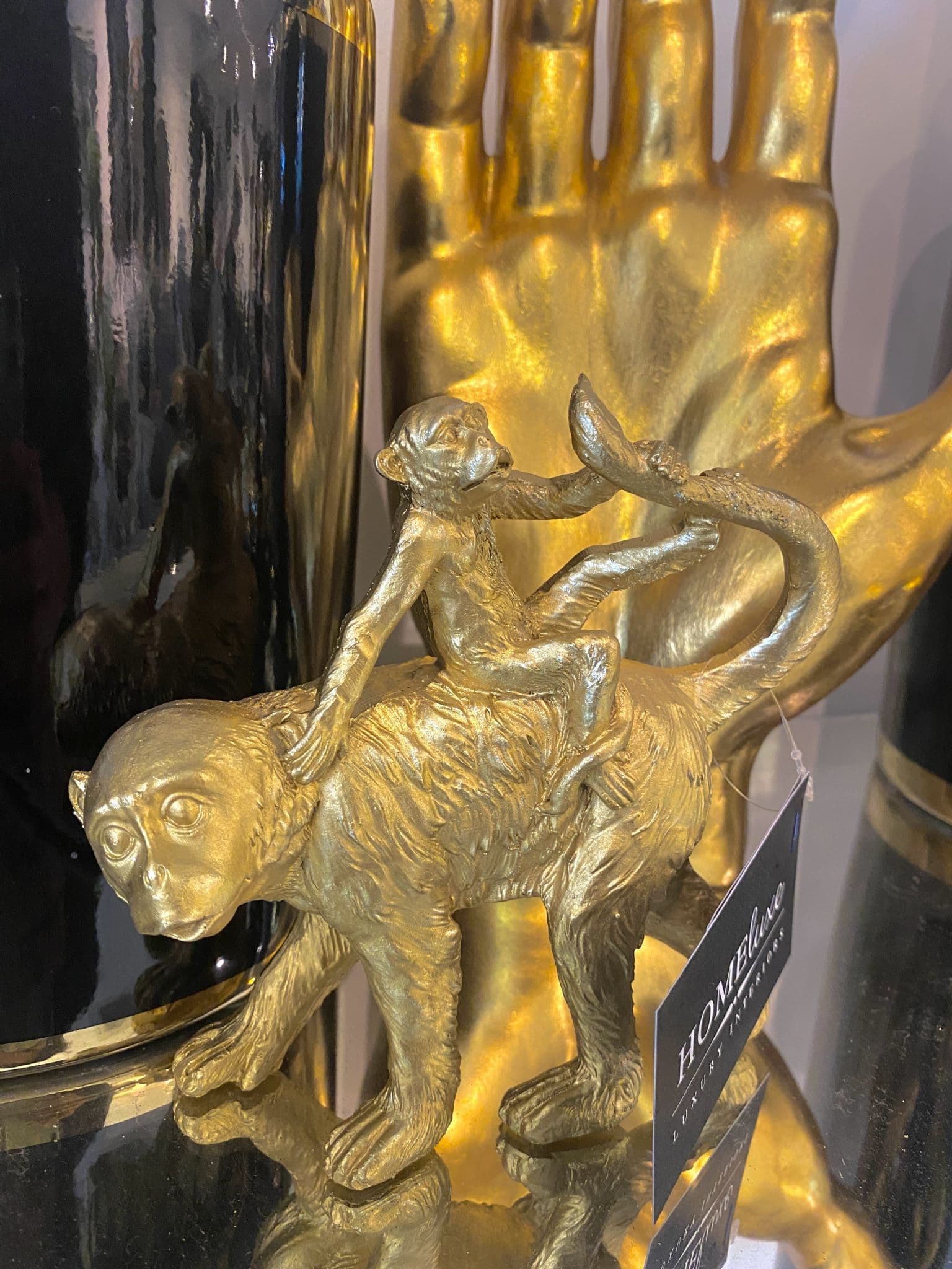 Gold Monkeys With Figurine