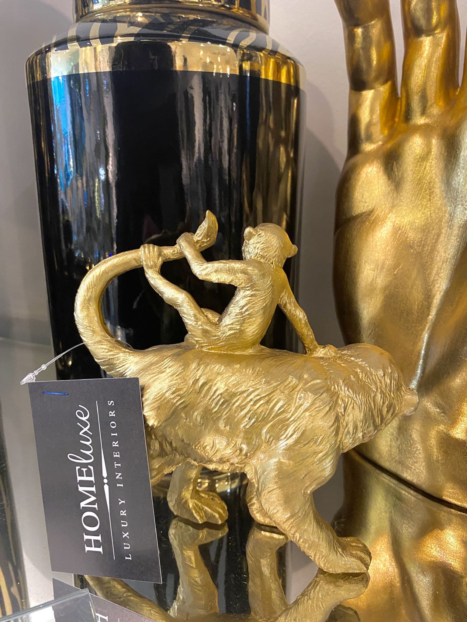 Gold Monkeys With Figurine