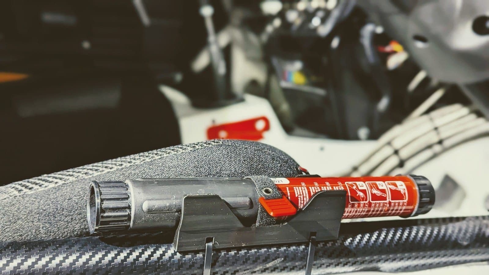 Fire Safety Stick Bracket for Roll Bar Mounting | Cobra Seats Shop