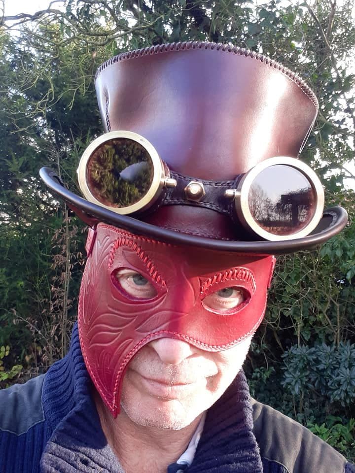 Ox blood mask with embossing and raised eye brow