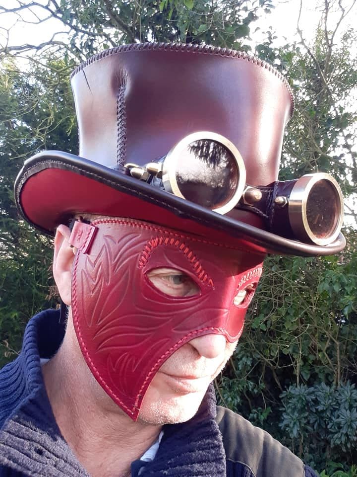 Ox blood mask with embossing and raised eye brow