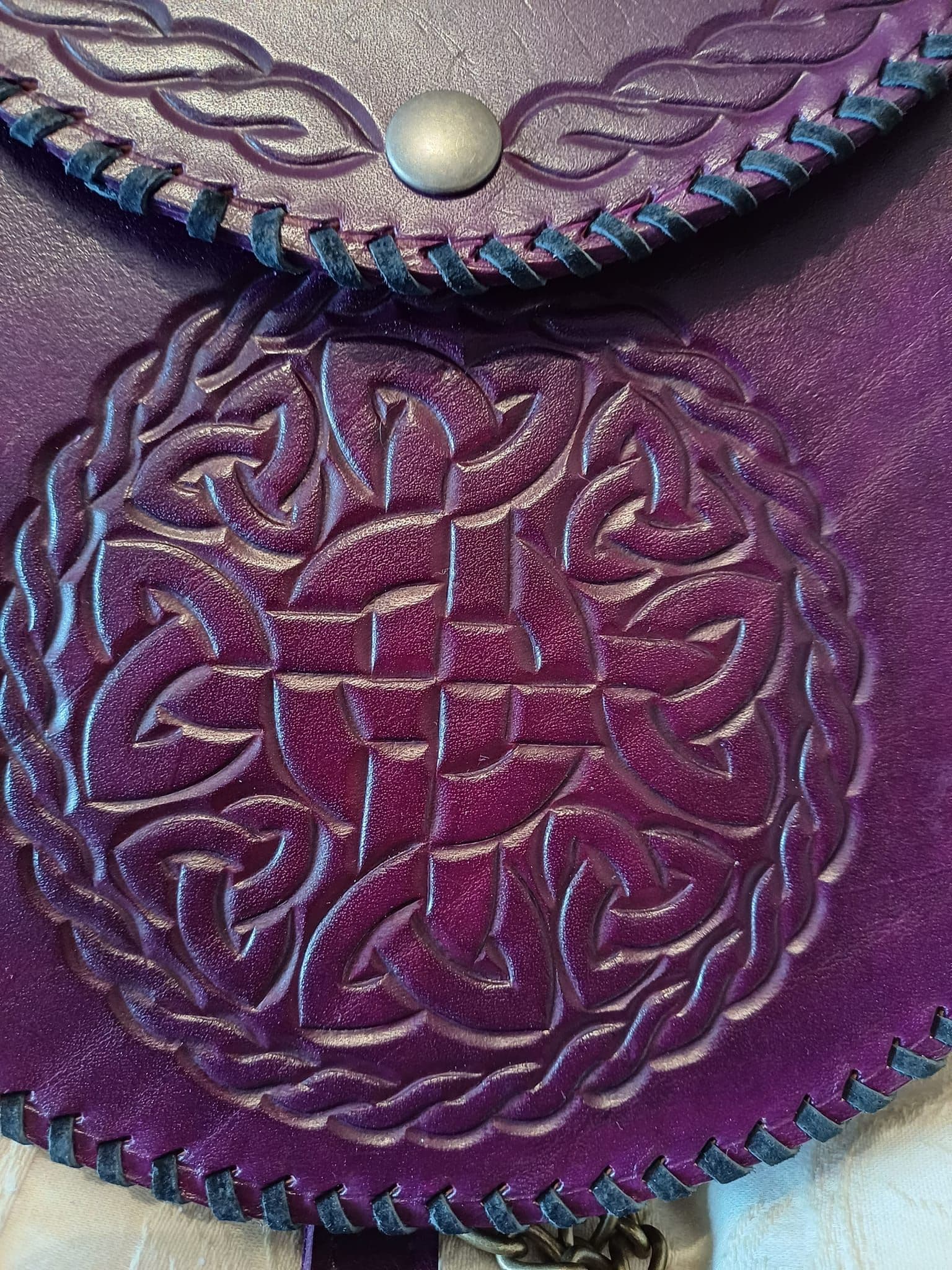 Sporran in purple with circular Celtic knot