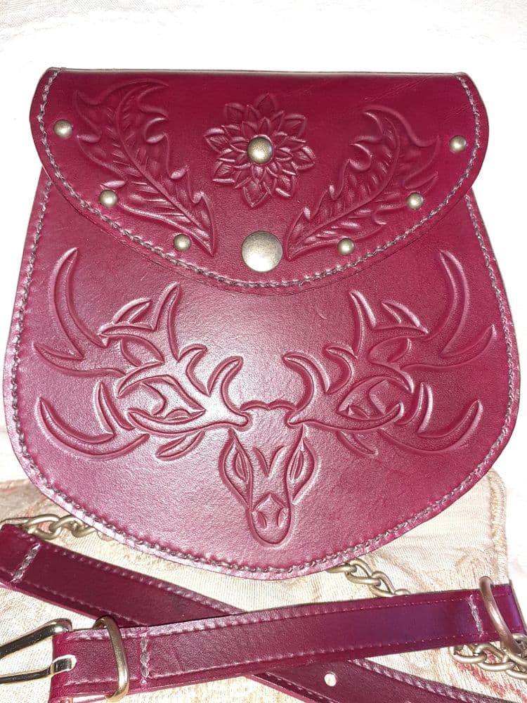 Sporran with stags head embossing and brass studding