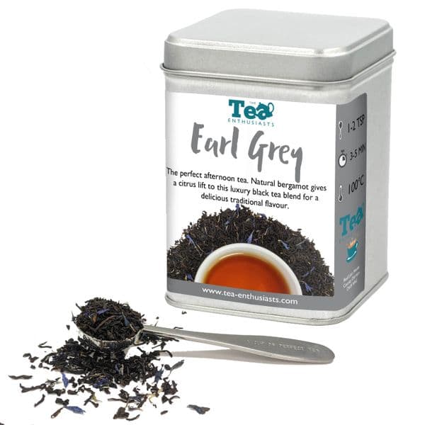 Loose leaf Earl Grey tea with blue flower