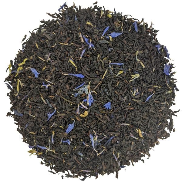 Loose leaf Earl Grey tea with blue flower