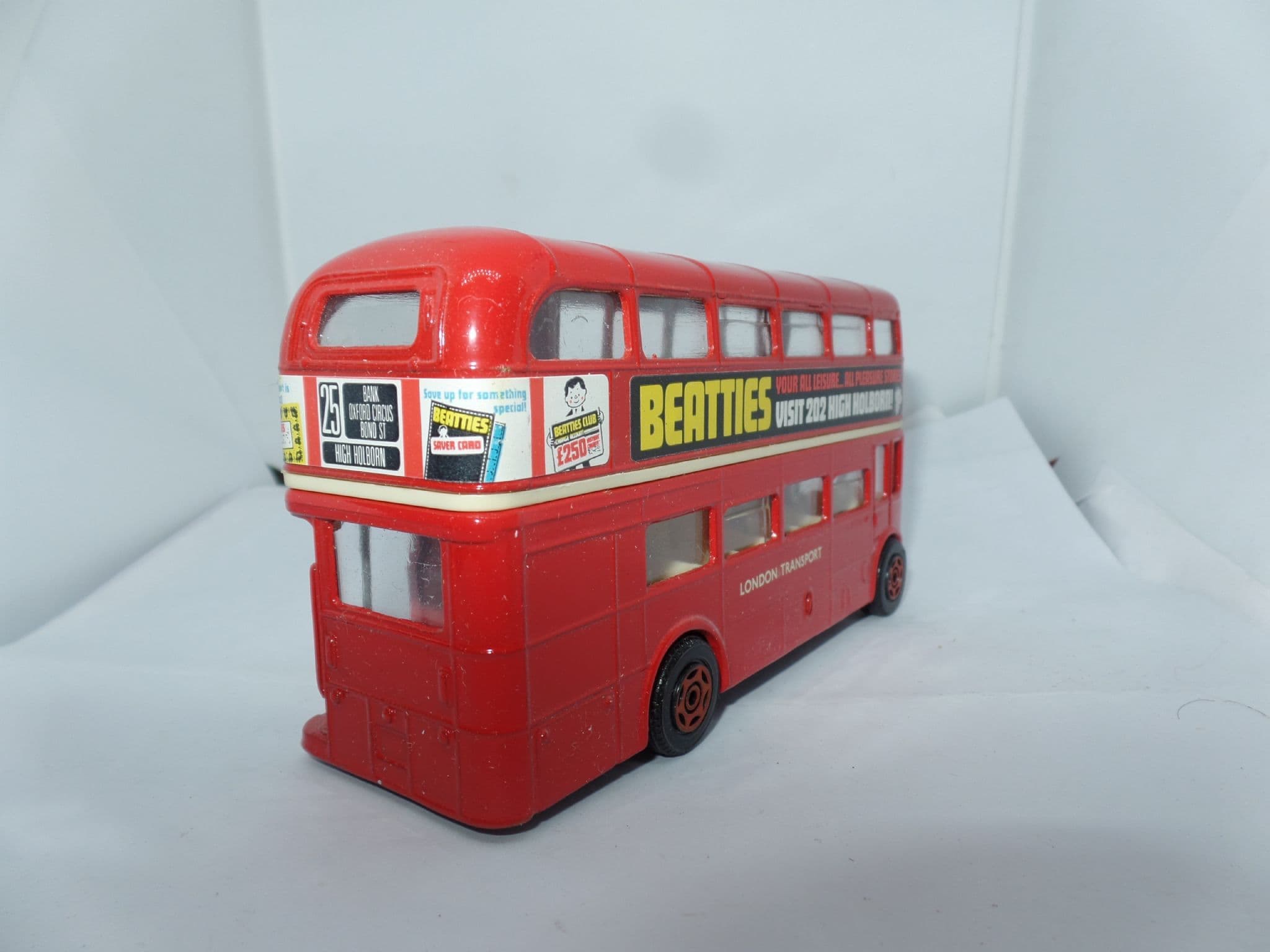 Corgi 469 1/64 London Transport Routemaster Bus Beatties 25 High Holborn UB