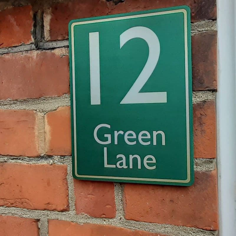 Green & brass vintage house sign