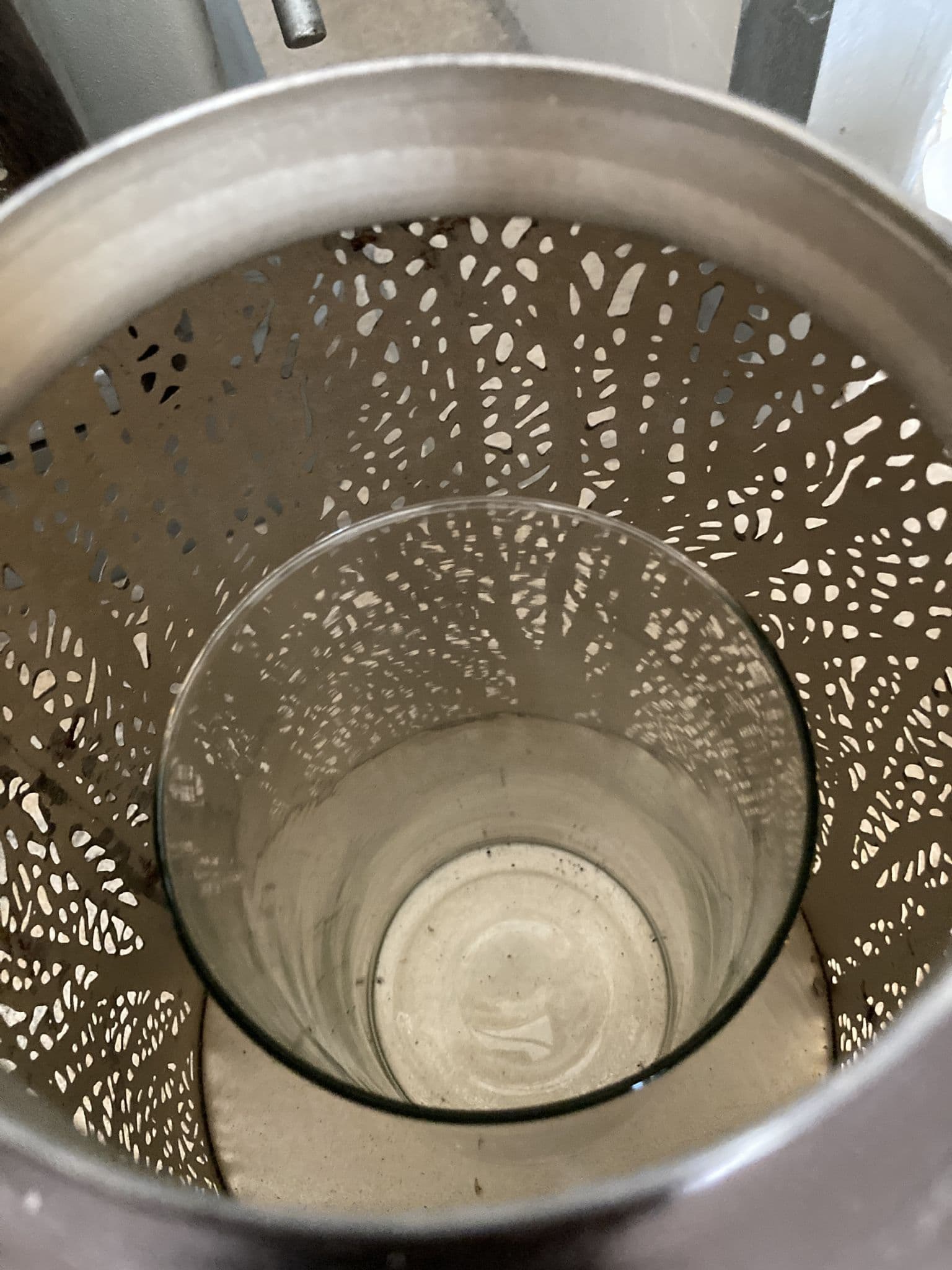 Large cut out forest design metal lantern