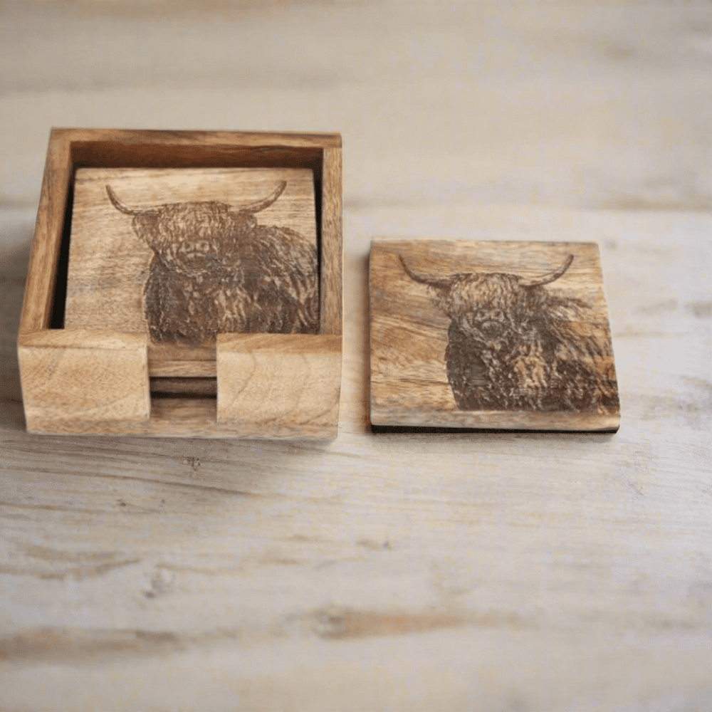 SET OF 4 ETCHED MANGO WOOD COASTERS IN HOLDER - highland cow