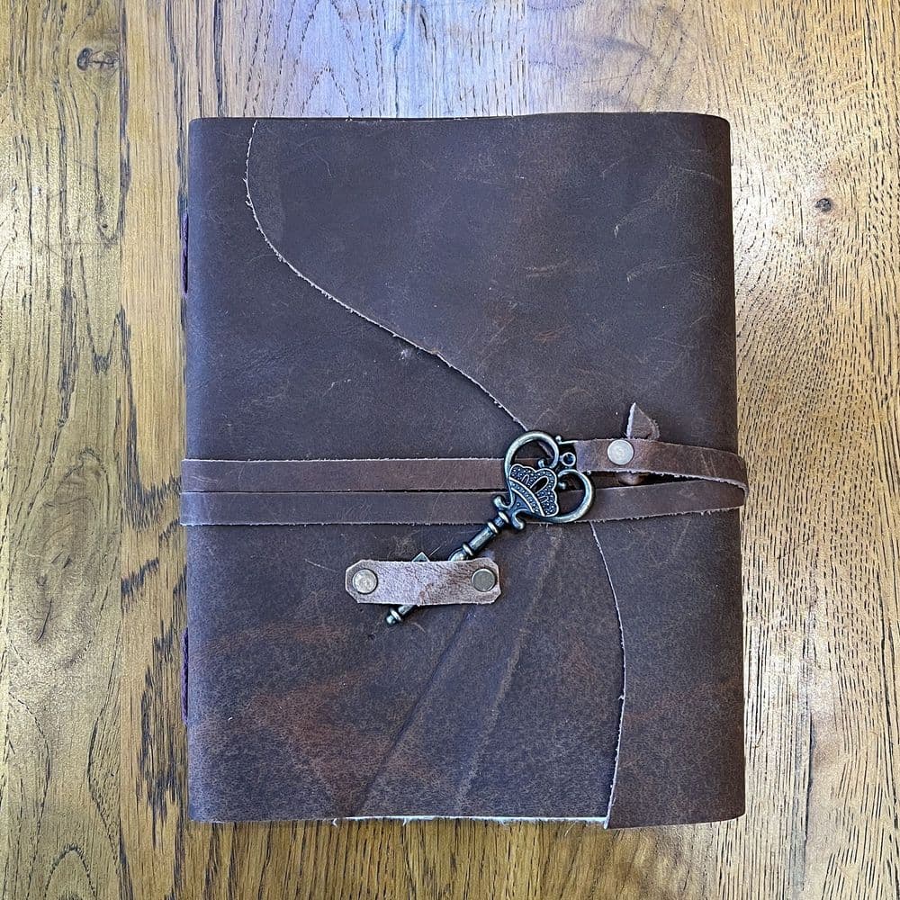 20cm soft leather foldover notebook with key fastening