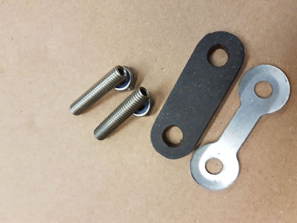 Uprated chain tensioner spread plate and lock tab kit