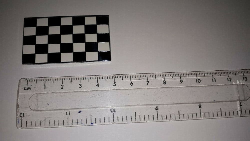 CHEQUERED FLAG BADGE ENAMELED STICK ON 50 x 30