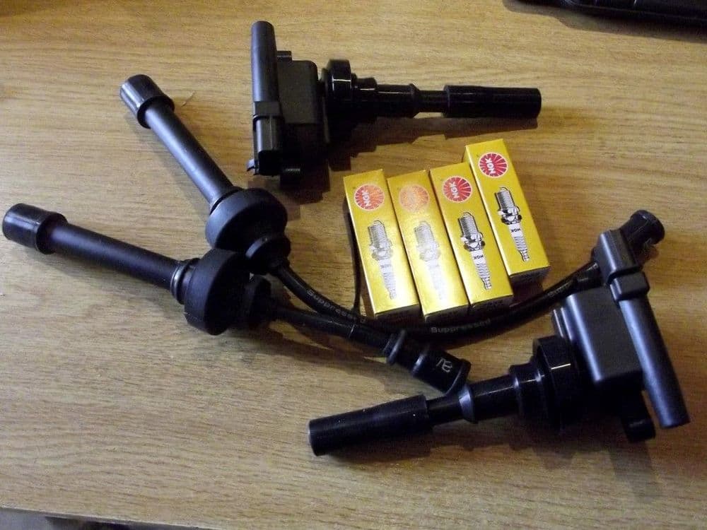 Coil Pack HT lead & spark plug set Mitsubishi Pajero Jr MD325592 2 x ...