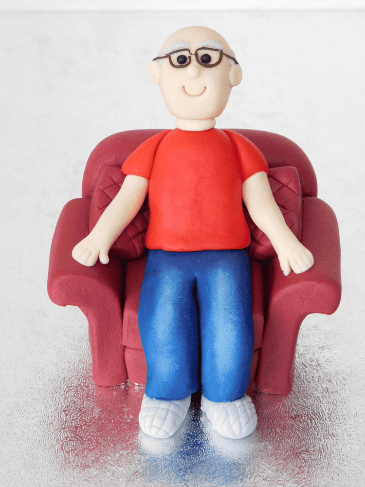Man in Armchair Cake Topper
