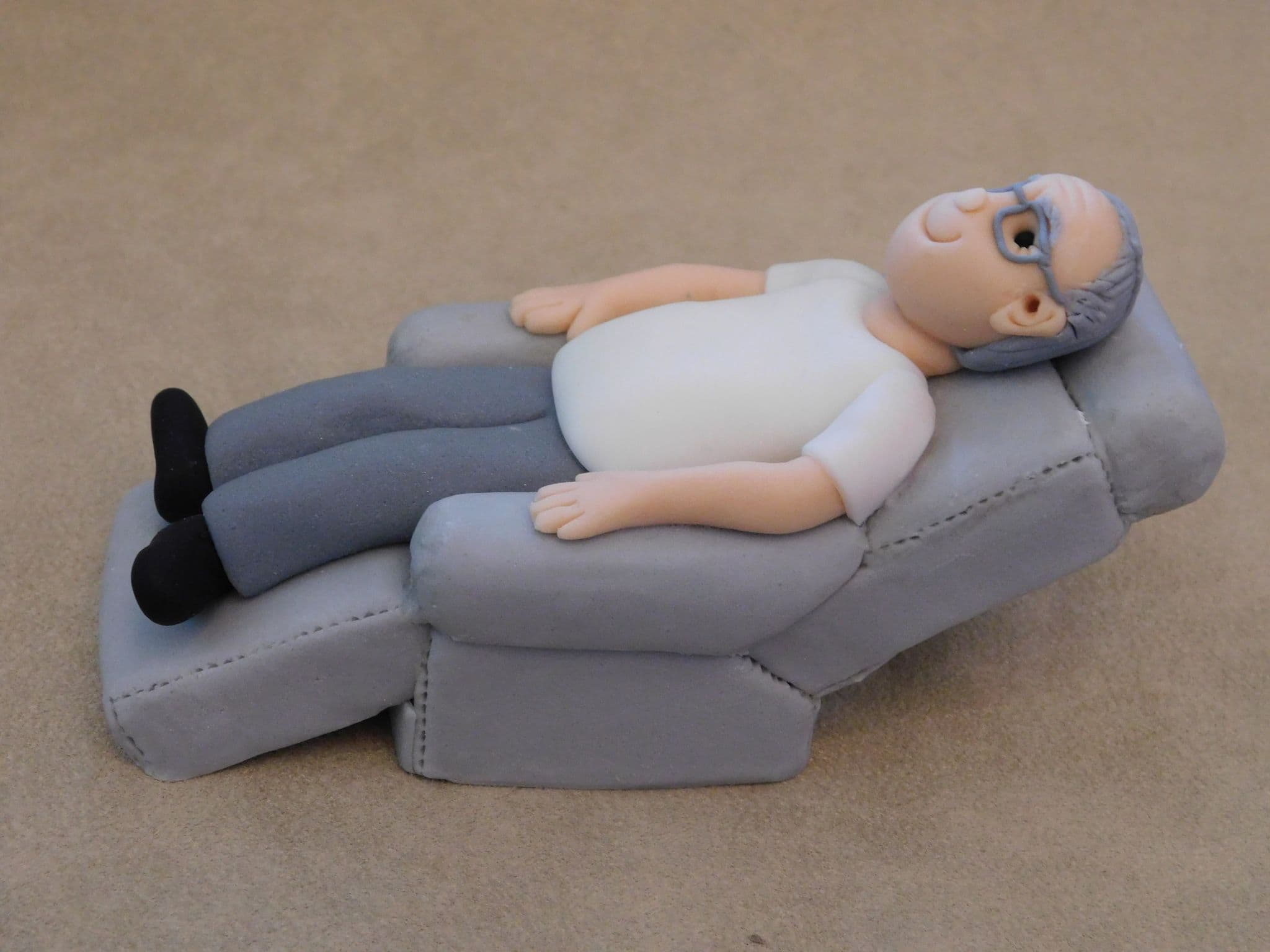 Man in recliner chair Cake Topper