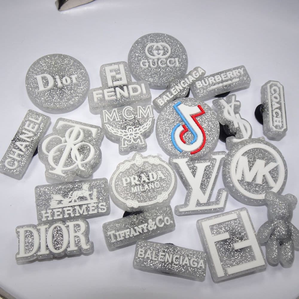 20 Assorted Speckled Silver Brand Logo S Shoe Charm