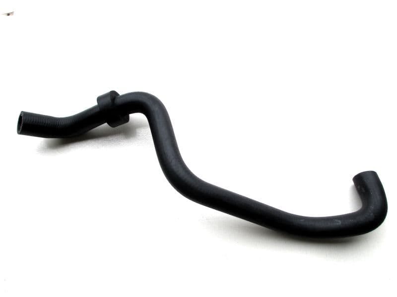 Bypass hose runs from back of water pump to inlet manifold