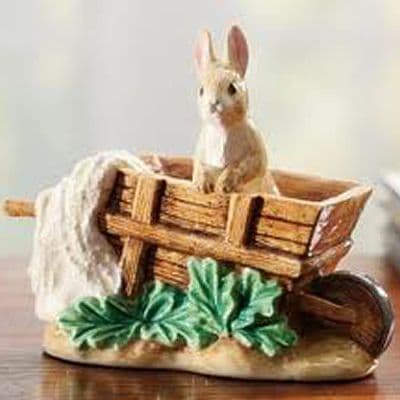 Peter Rabbit in a wheel barrow