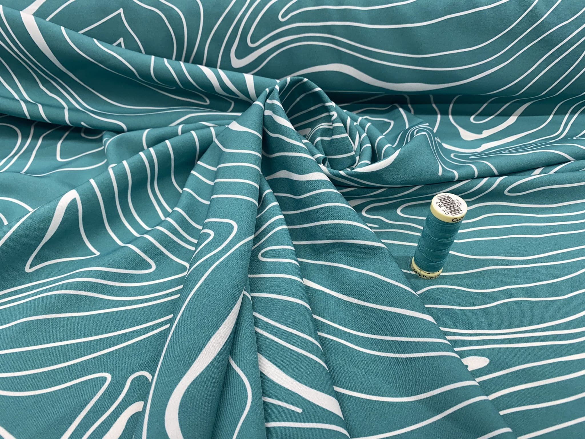 LINES Turquoise and White Curved Lines Viscose Dressmaking Fabric