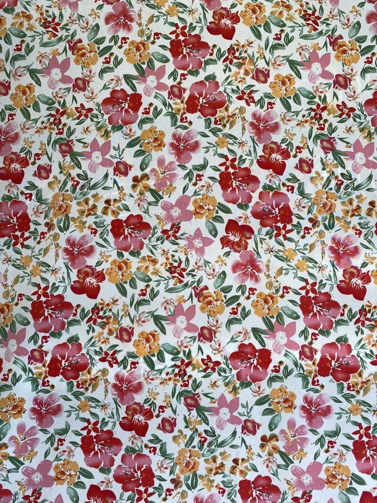 Polyester Dress Fabric - Coral and Orange Hibiscus Flowers on Cream