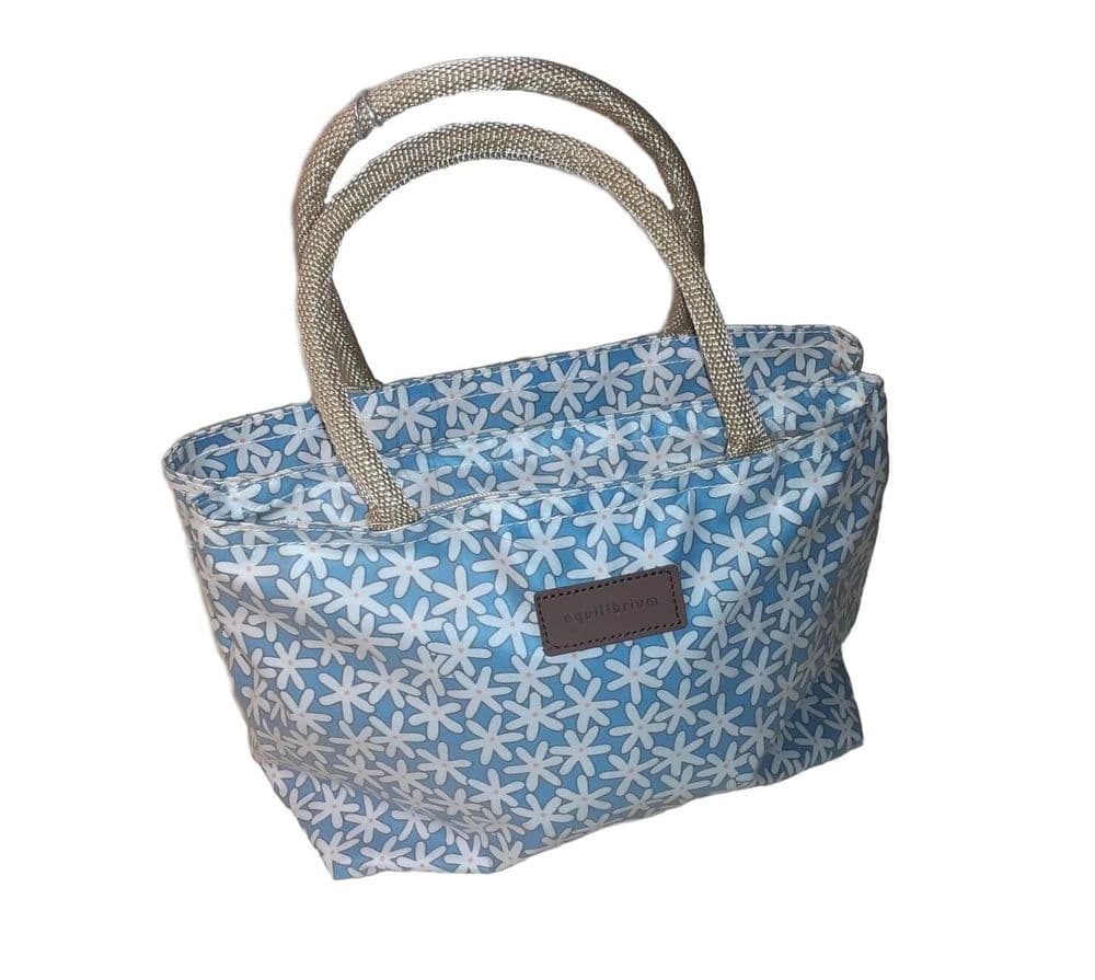 Daisies Pale Blue Wipe able Bag by Equilibrium