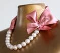 Pink pearl and ribbon necklace