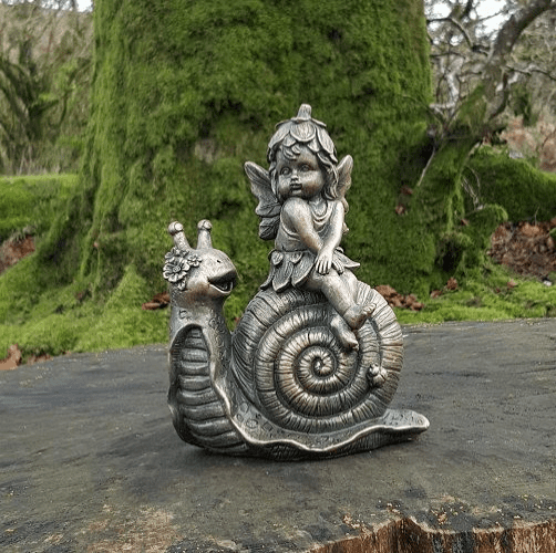 Bronze Effect Fairy on a Snail.