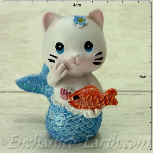 Mermaid Cat - Tuna in Blue holding a toy fish - 4.5cm tall.