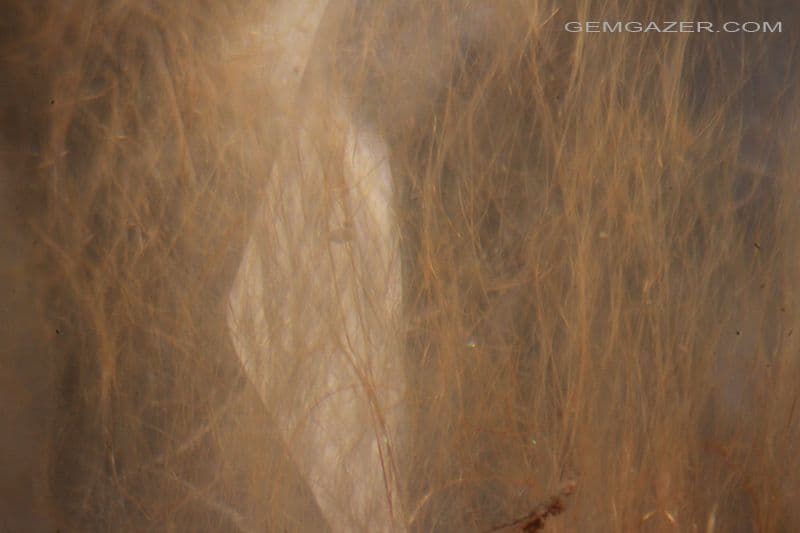 Albite Feldspar Plagioclase with Astrophyllite faceted Pakistan 1 24 carats