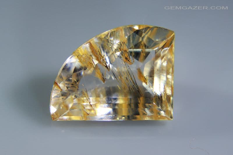 Colourless Topaz with golden yellow Limonite inclusions faceted Myanmar ...