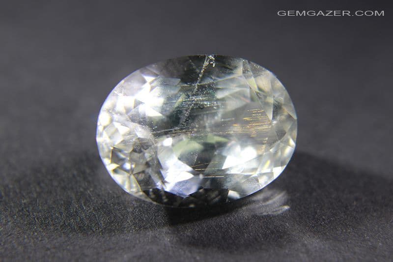 Colourless Topaz with Iridescent needle inclusions faceted Madagascar ...