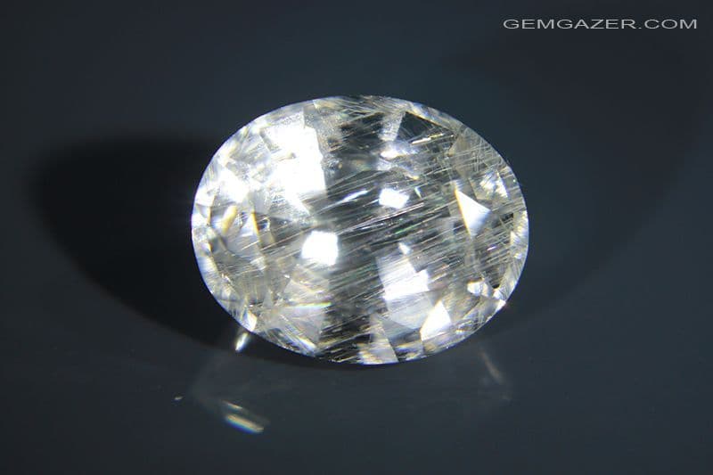 Colourless Topaz with Iridescent needle inclusions faceted Madagascar 3 ...