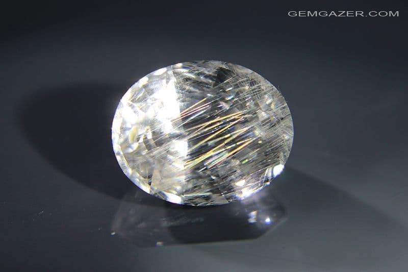 Colourless Topaz with Iridescent needle inclusions faceted Madagascar 3 ...